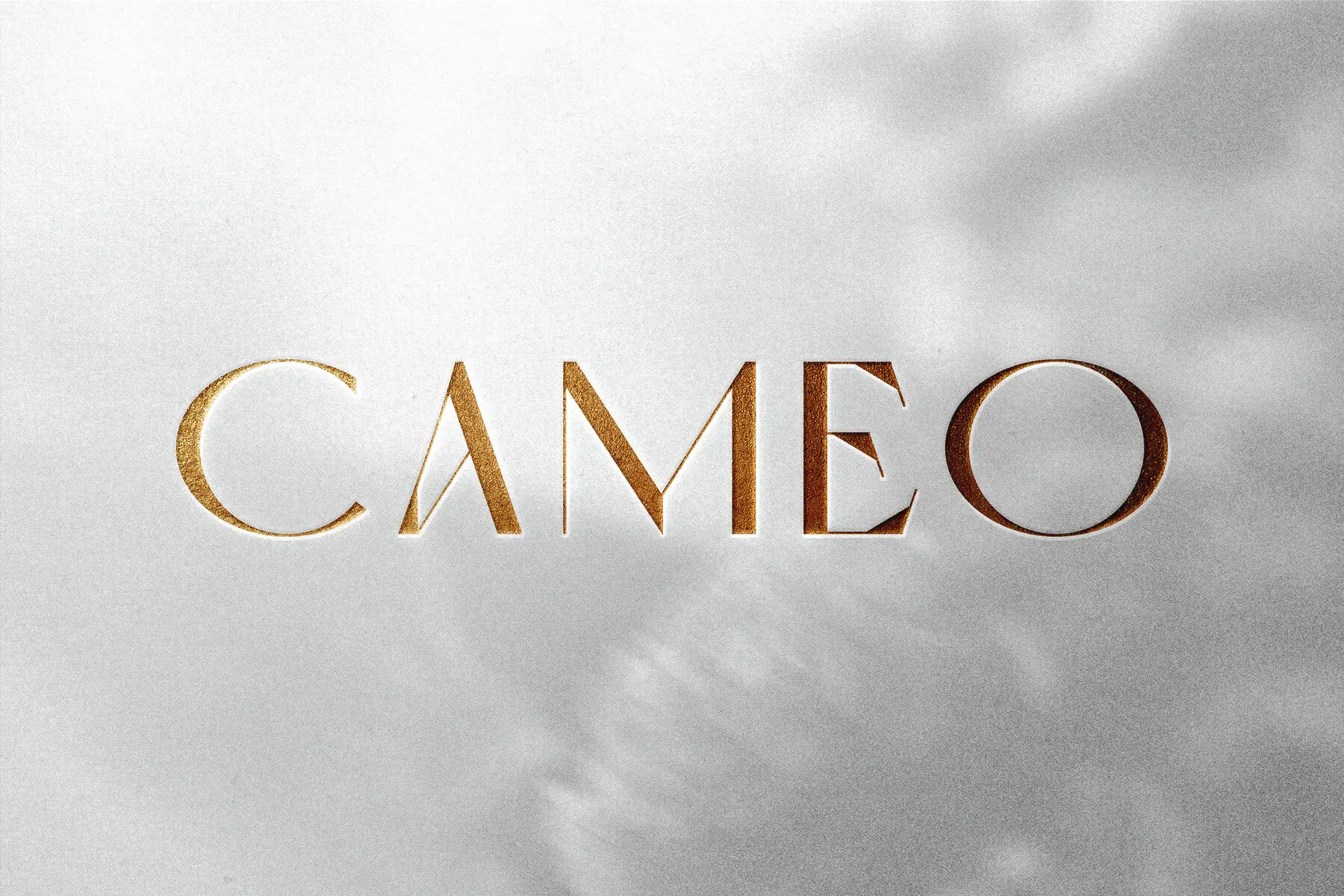 Golden Embossed Logo Text Mockup Graphics - YouWorkForThem