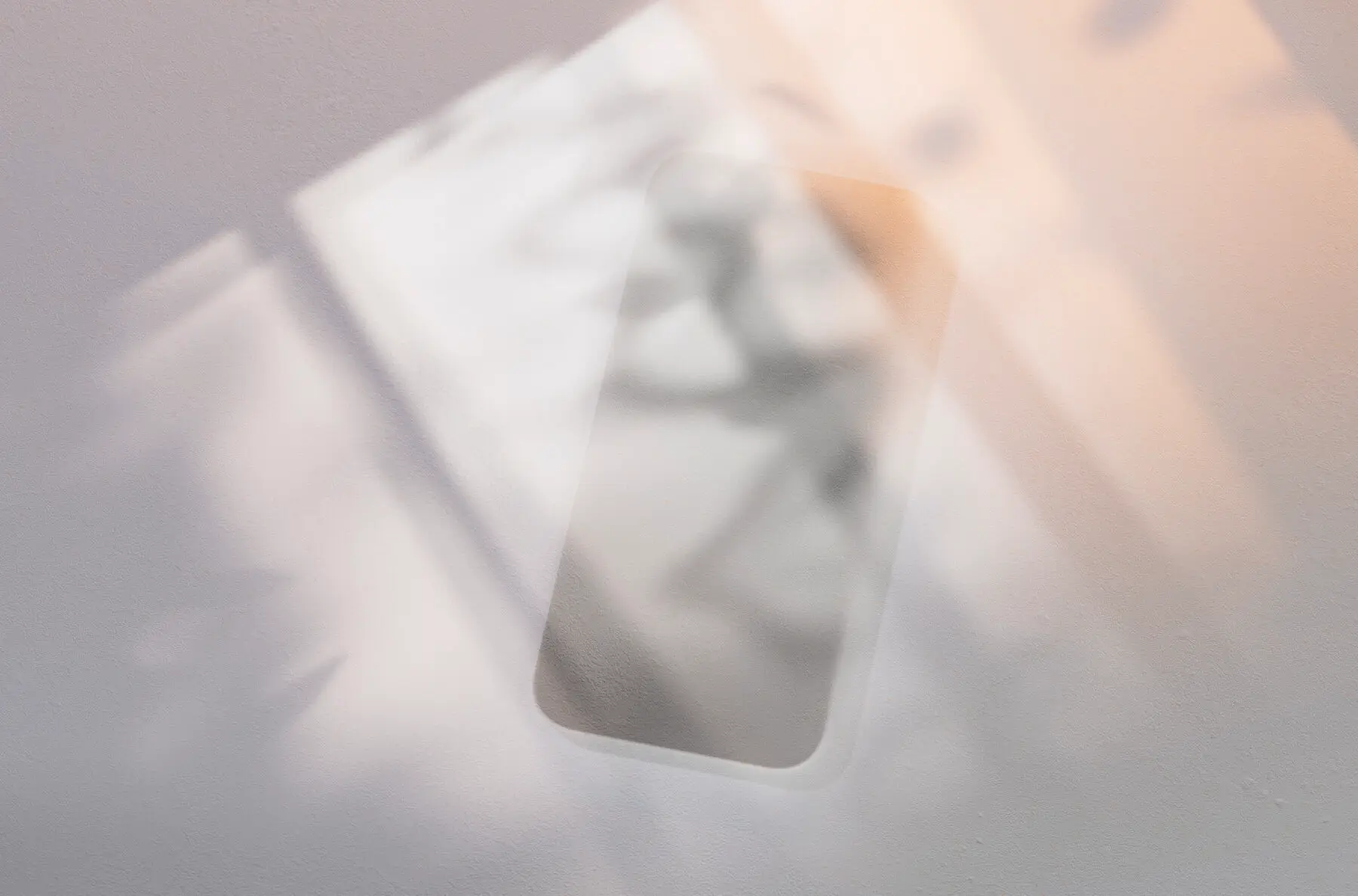 iPhone 14 Pro mockup scene with daylight shadow Mockups - YouWorkForThem
