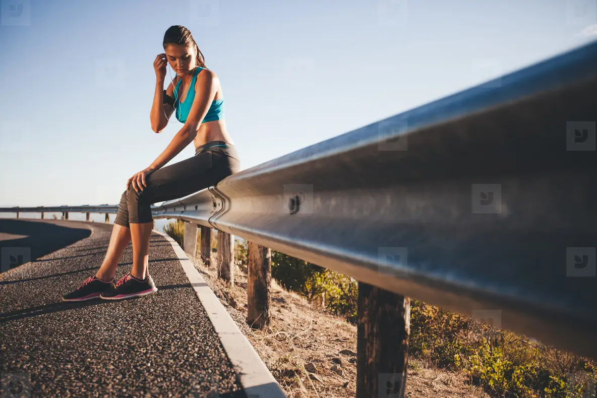 Young Athlete Taking Break From Running Workout Photo (122154 ...