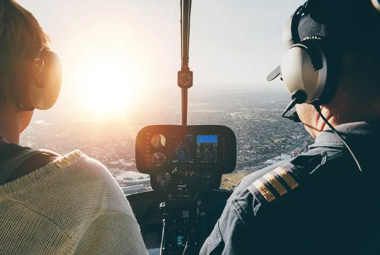 Pilots Flying A Helicopter On Sunny Day Photo (122672) - YouWorkForThem