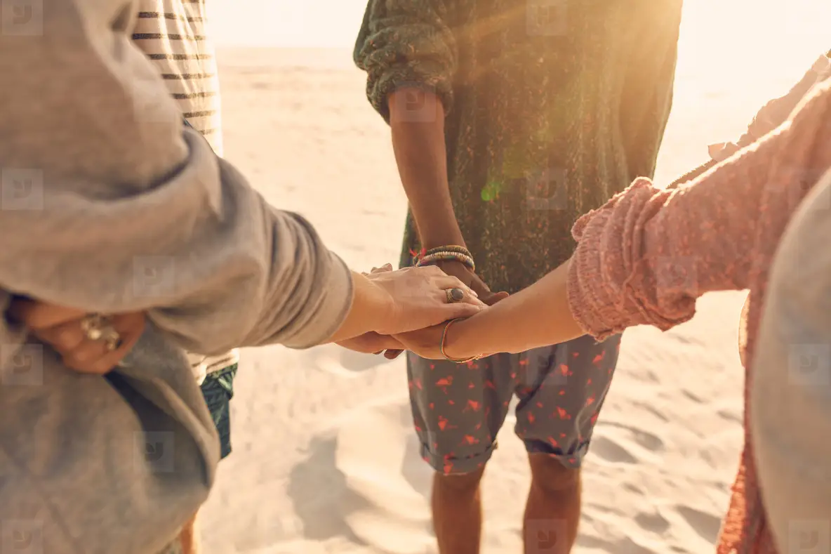 Group Of Friends Stack Their Hands Together Photo (122803) - YouWorkForThem