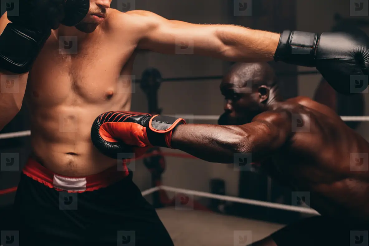 Nimble Black Athlete Strikes His Challenger Photo (126635) - YouWorkForThem