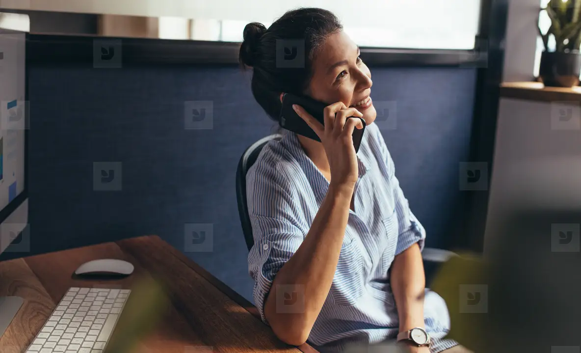 Female Business Professional Making A Phone Call Photo (132622 ...