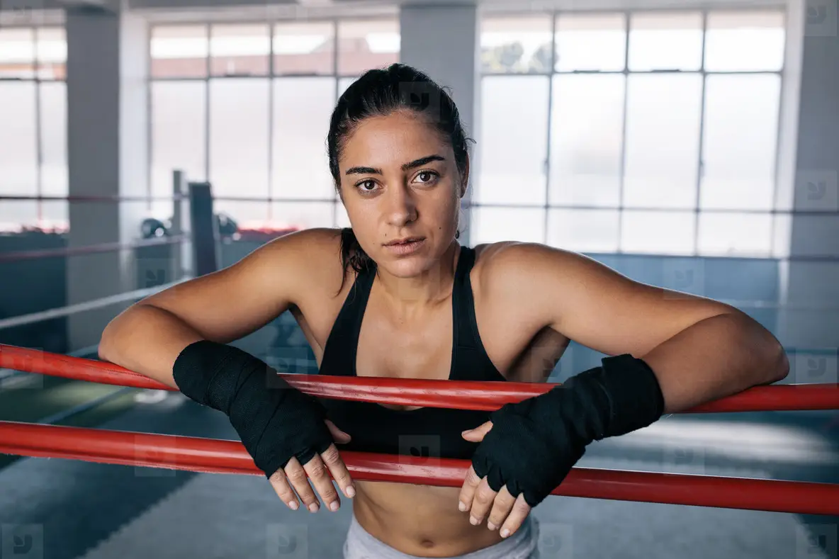 Female Boxer Inside A Boxing Ring Photo (133753) - YouWorkForThem