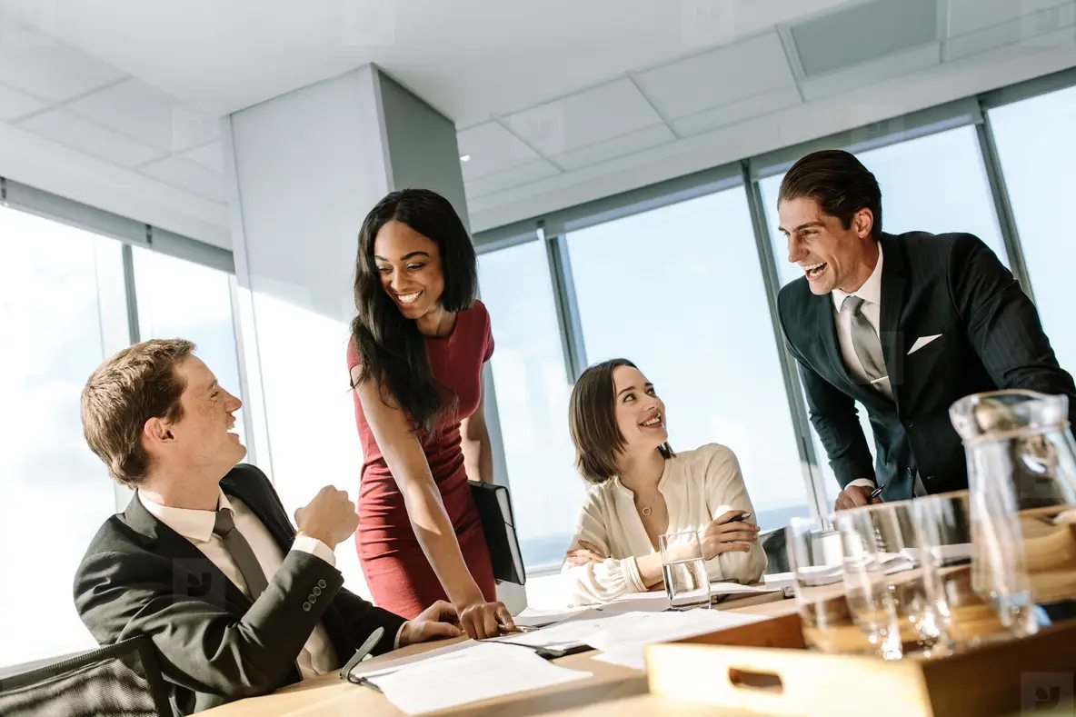 Diverse Business People Smiling During A Meeting Photo (136096 ...