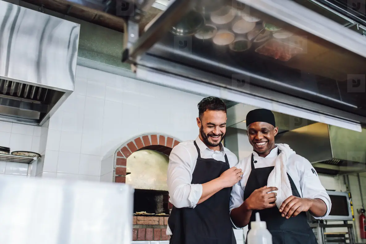 Smiling Professional Chefs Working In Restaurant Kitchen Photo (137360 ...