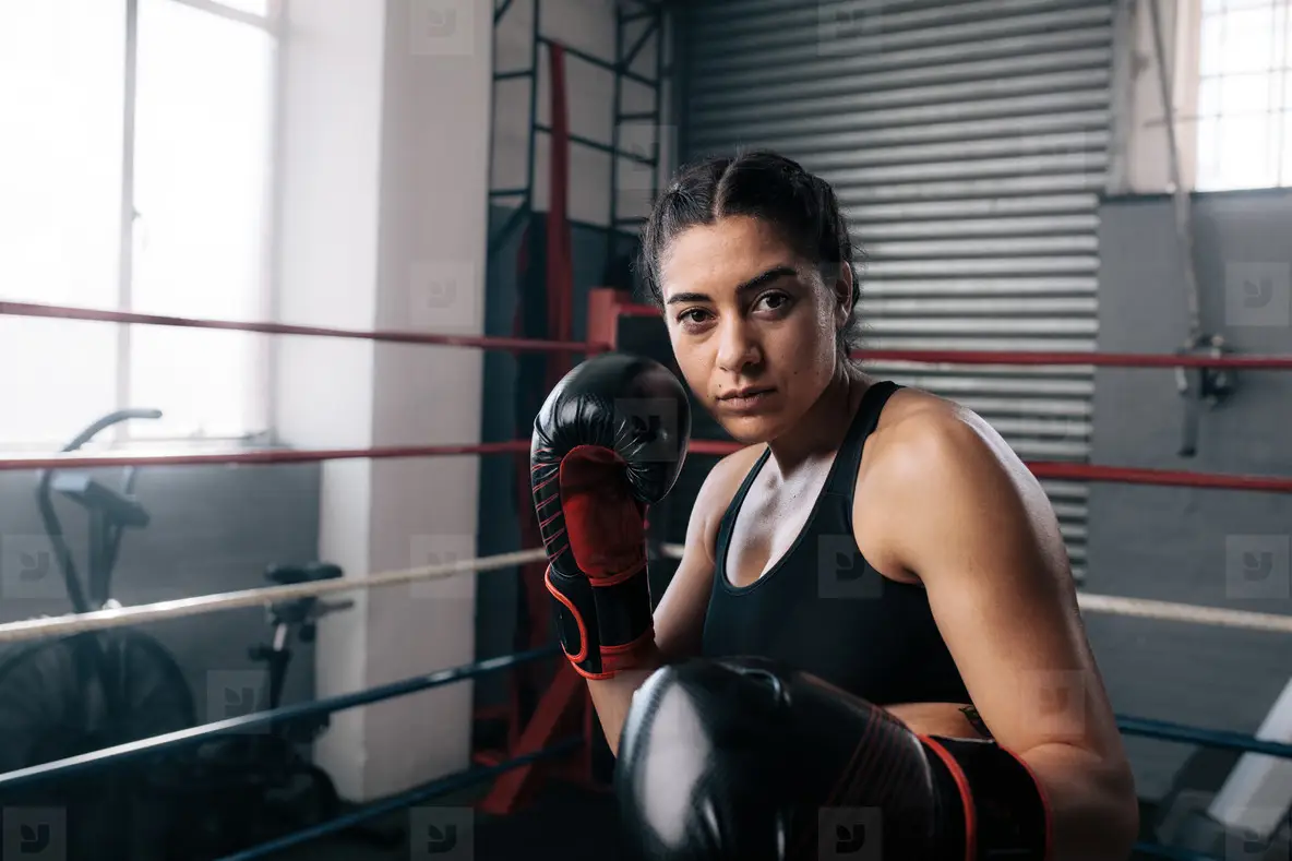 Female Boxer Training Inside A Boxing Ring Photo (137655) - YouWorkForThem