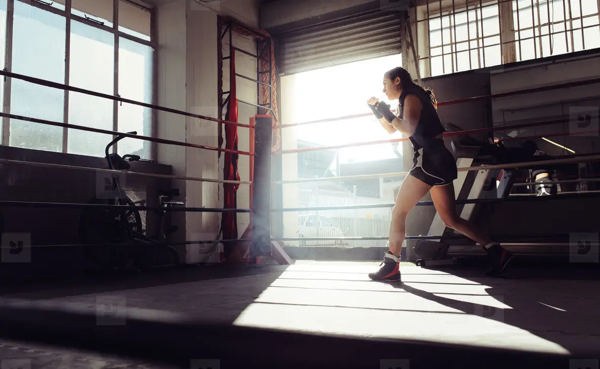 Female Boxer Training Inside A Boxing Ring Photo (139547) - YouWorkForThem