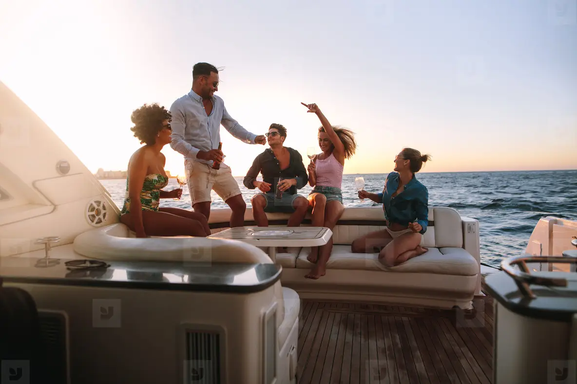Group Of Friends Enjoying In A Boat Party Photo (143152) - YouWorkForThem
