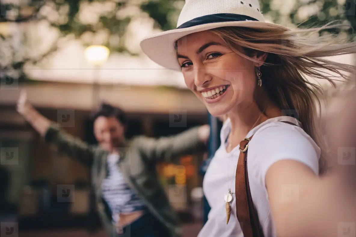 Woman Talking Selfie Outdoors With A Friends Photo (143572 ...