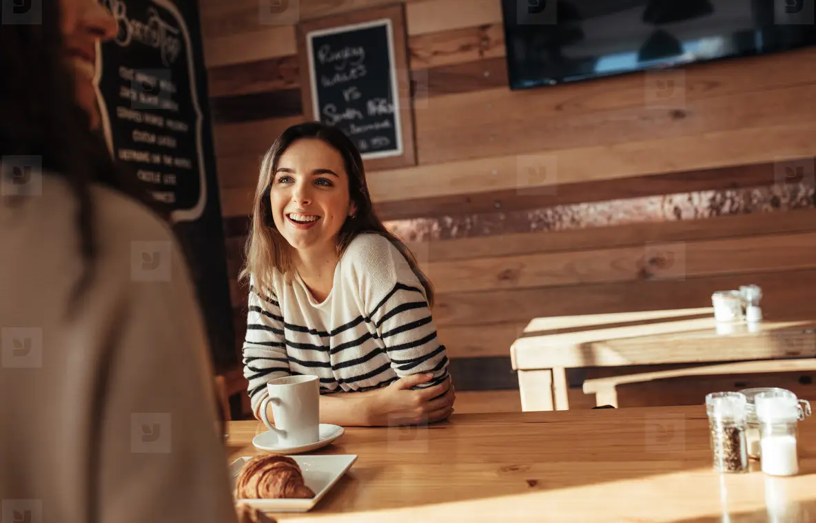 Friends Sitting In A Cafe And Talking Photo (144258) - YouWorkForThem