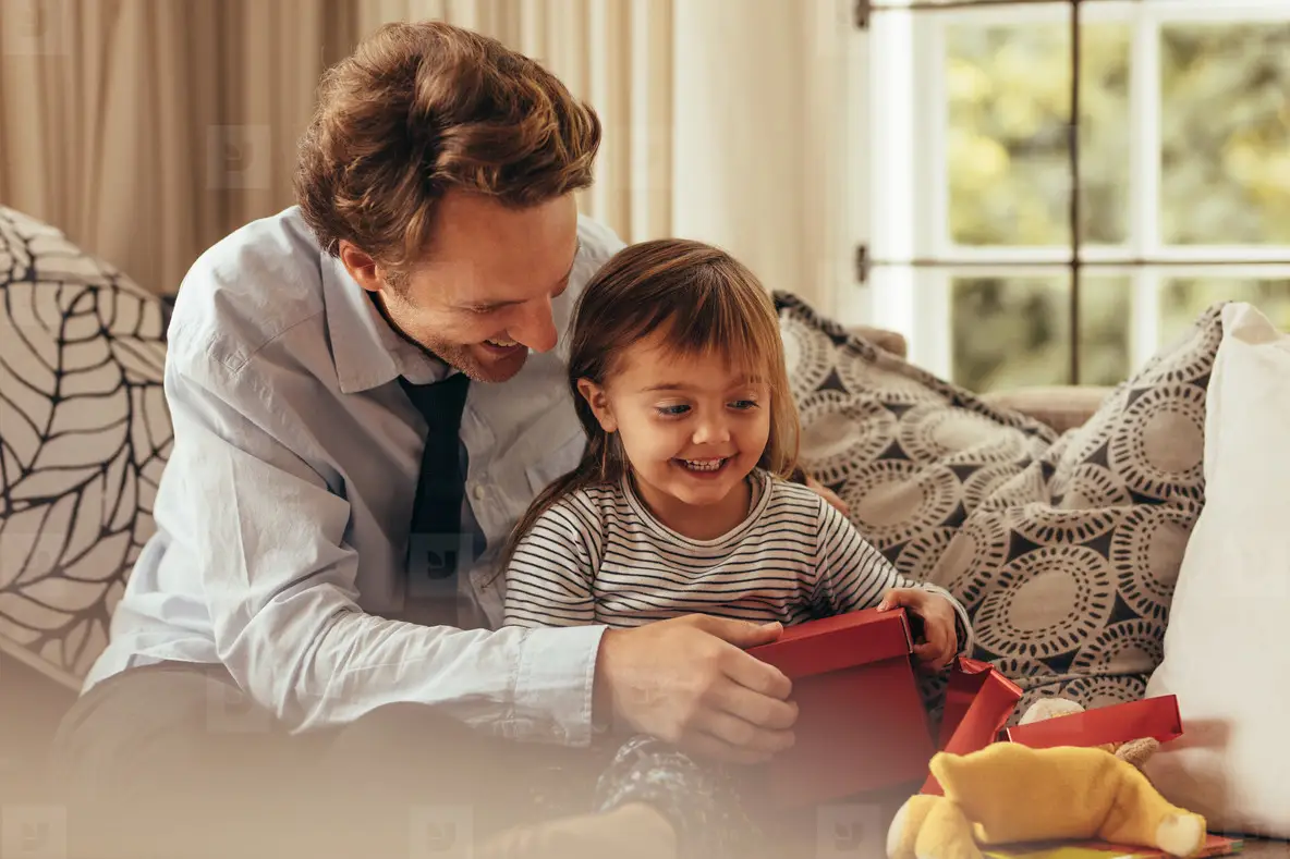 Father And Daughter Opening A Gift Box Photo (145742) - YouWorkForThem