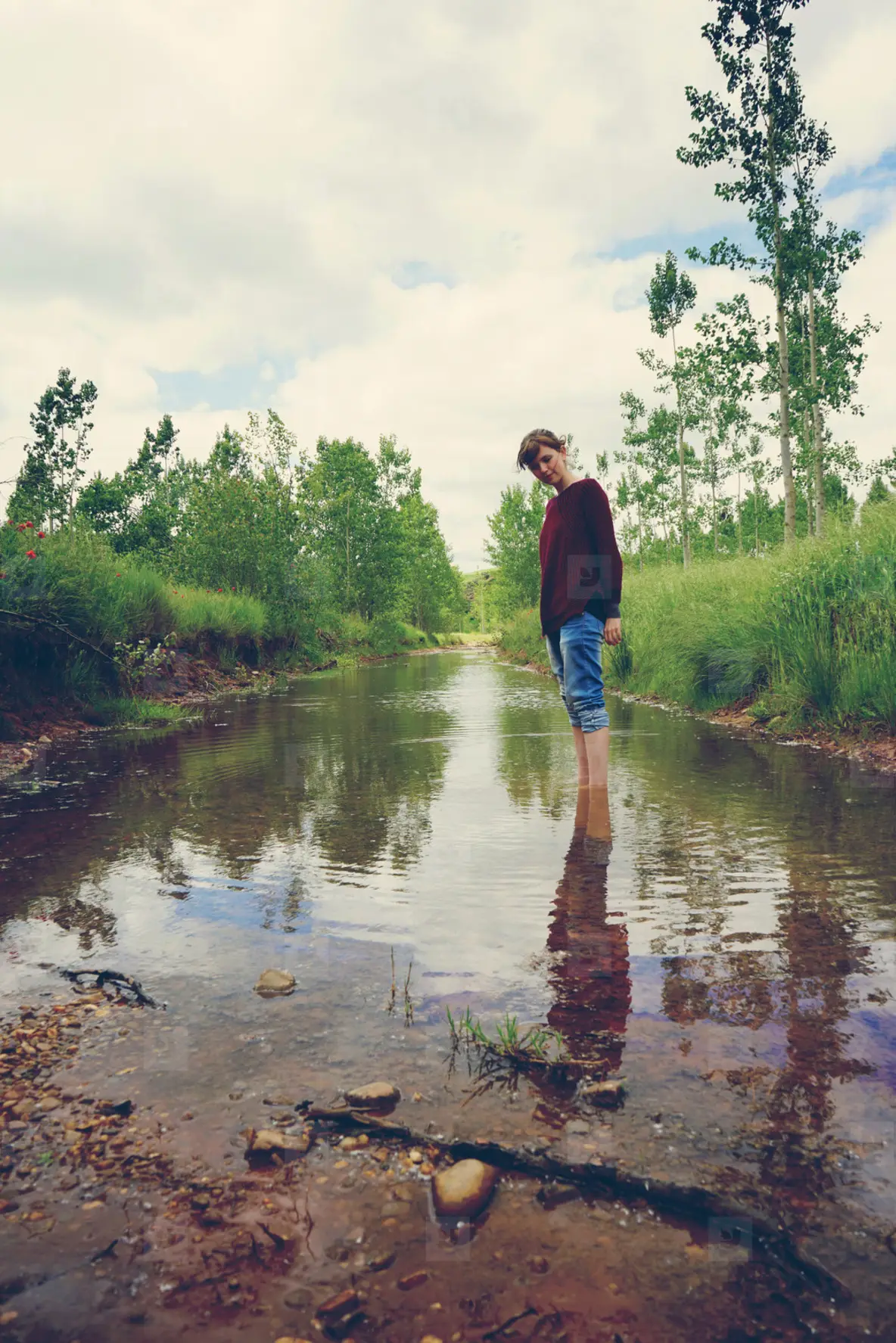 Young Woman In Front Of A River Photo (152124) - YouWorkForThem