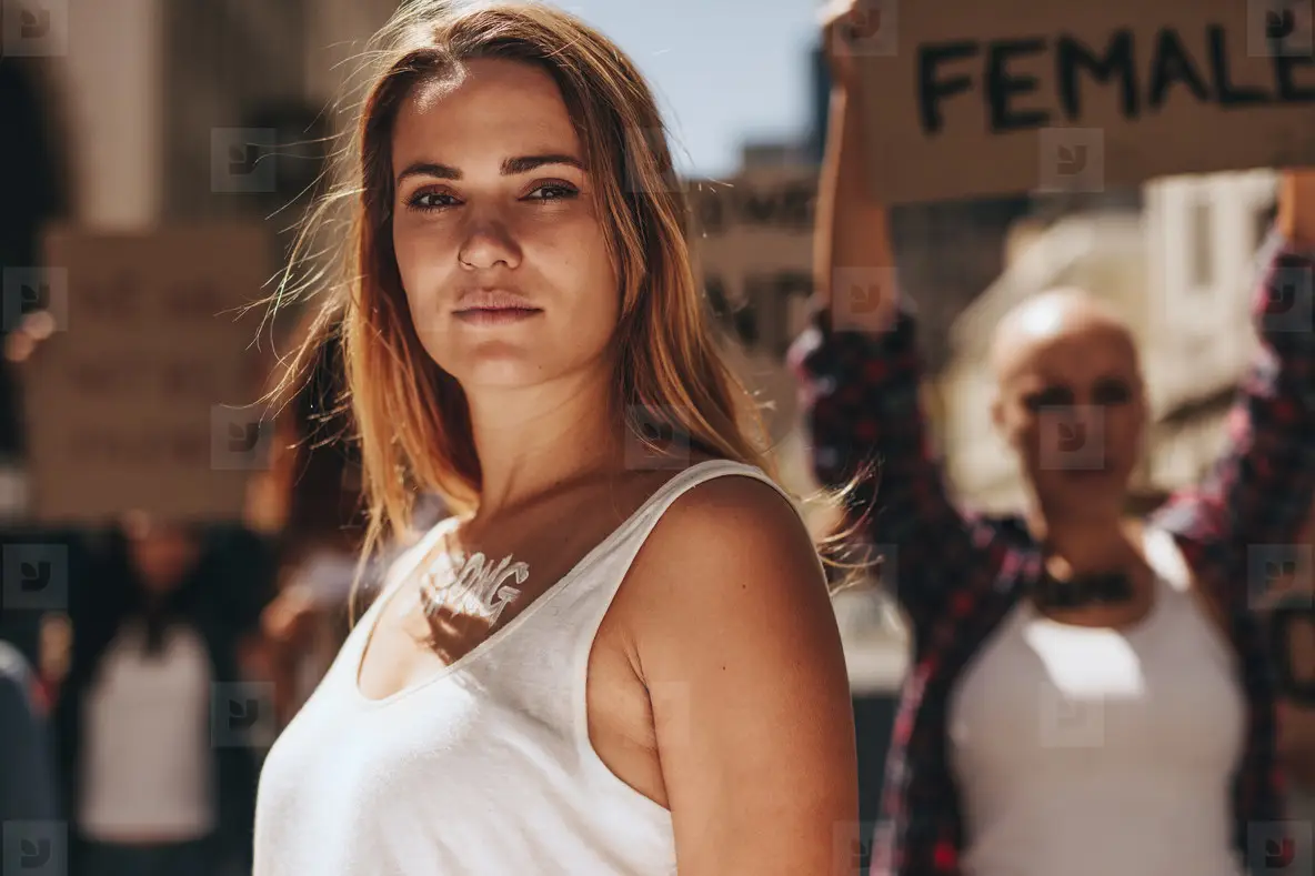 Strong Young Female Activist Protesting Photo (162719) - YouWorkForThem