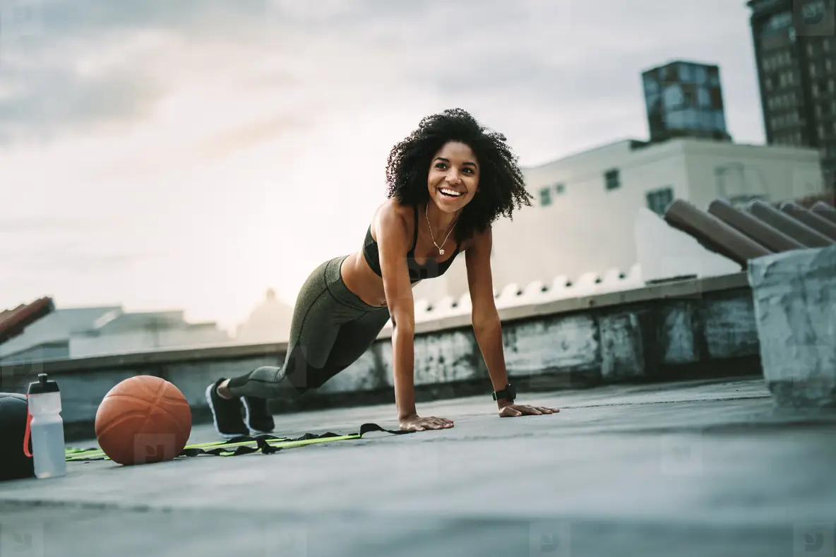 Fitness Woman Doing Push Ups On Rooftop Photo (163364) - YouWorkForThem