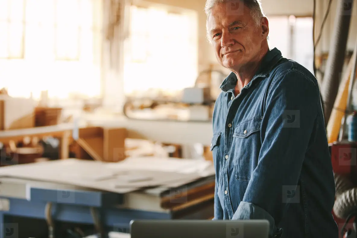 Senior Male Carpenter Standing In His Workshop Photo (163456 ...
