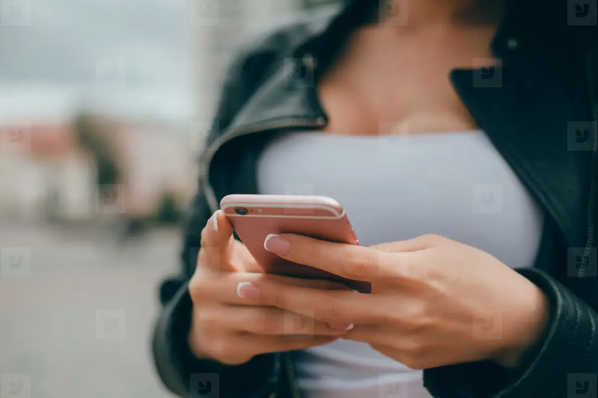 Woman Using Smartphone Photo (164036) - YouWorkForThem