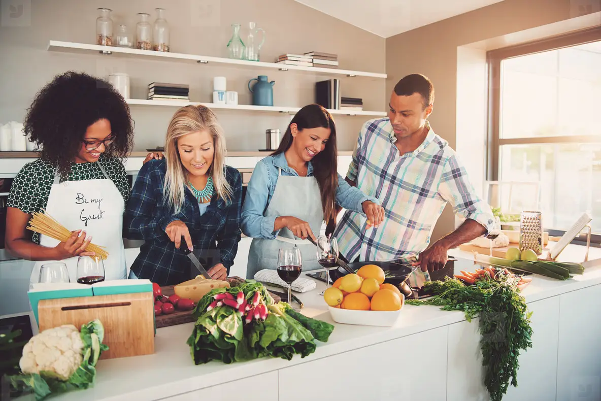 Four Mixed Friends Preparing A Meal In Kitchen Photo (173092 ...