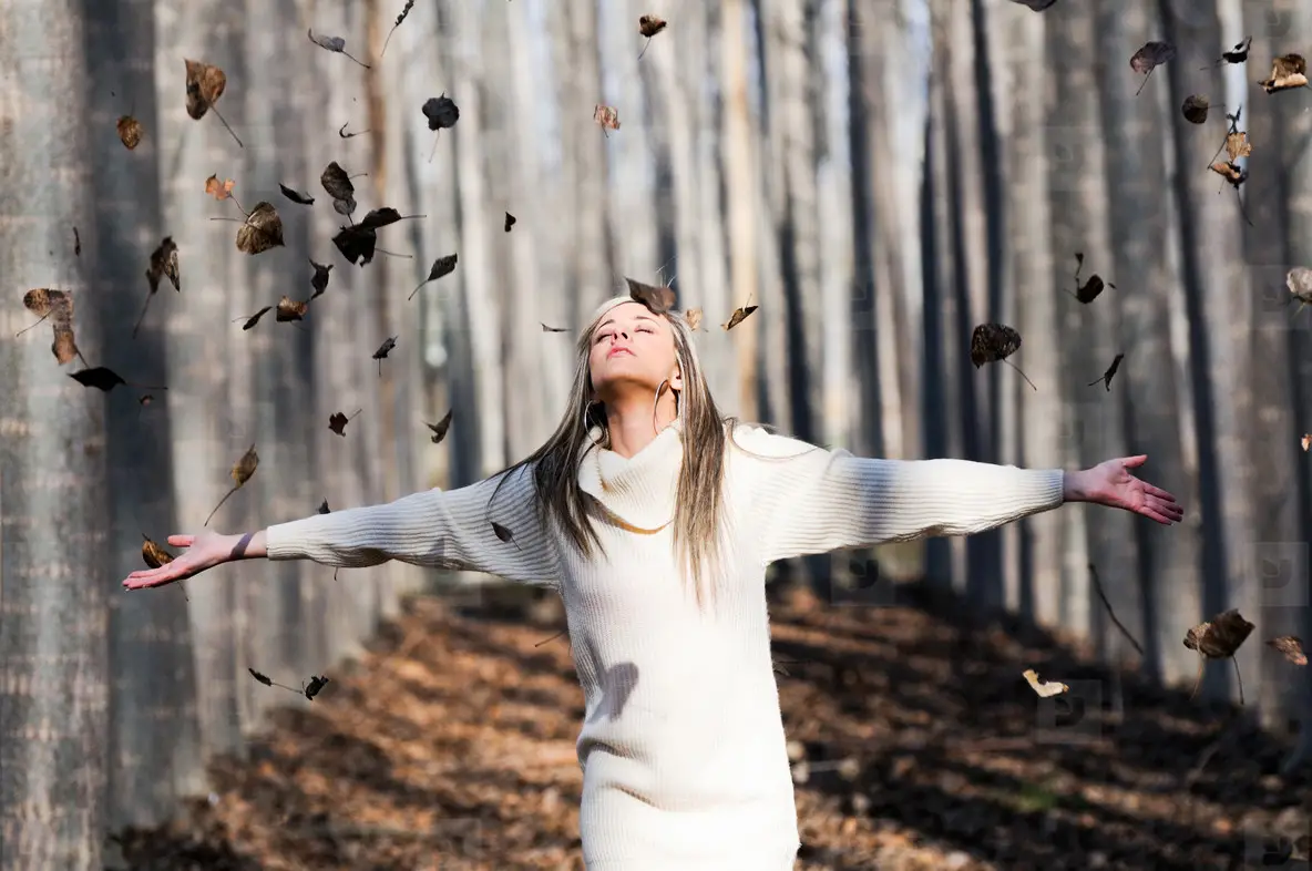 Beautiful Blonde Girl With Falling Leaves In The Autumn Park Photo ...
