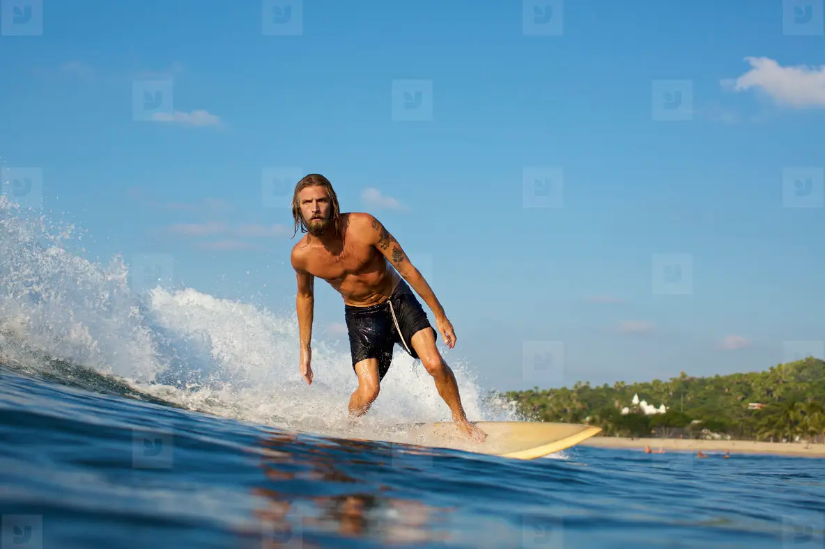 Male Surfer Riding Sunny Ocean Wave 02 Photo (187222) - YouWorkForThem