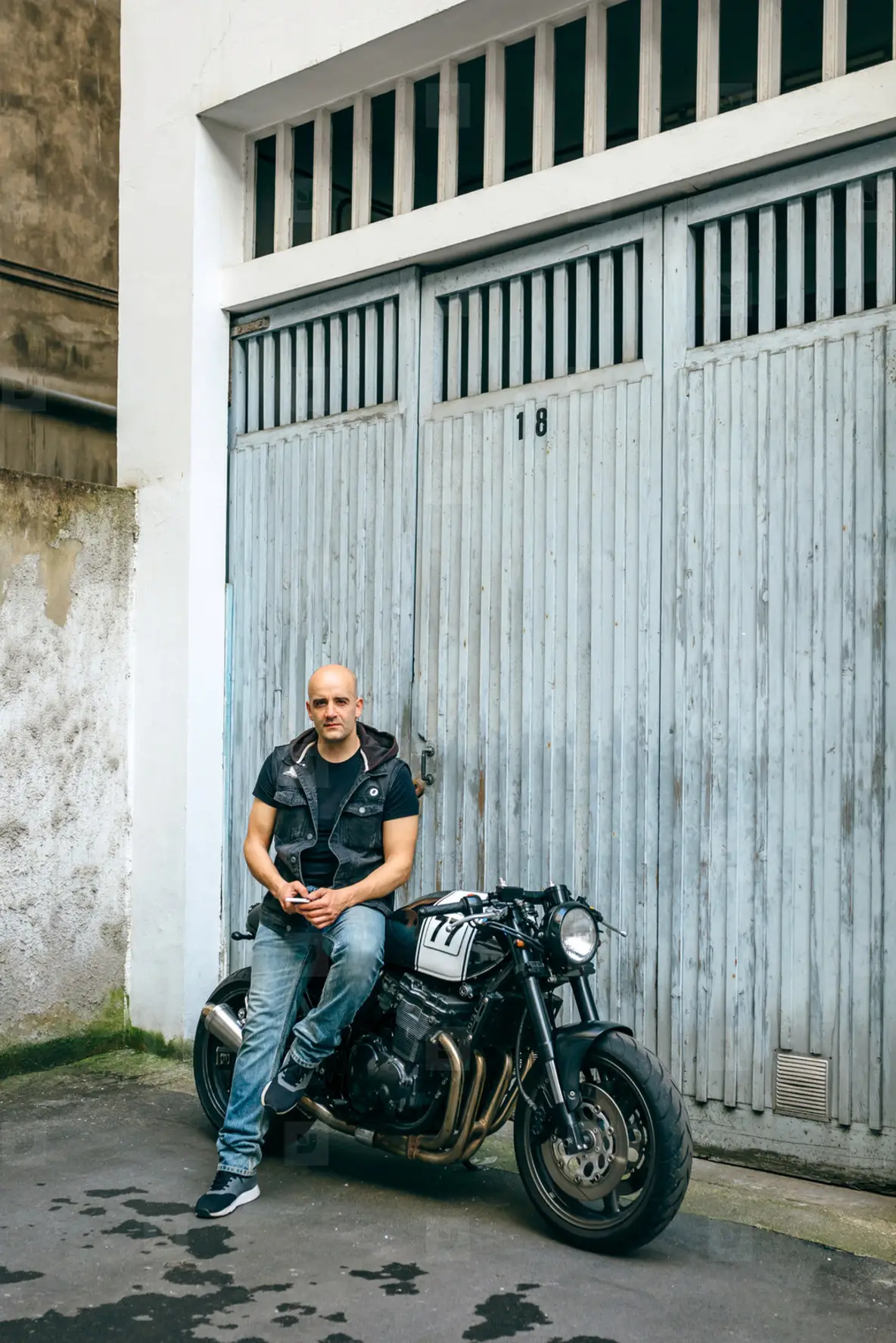 Biker Posing With A Motorcycle Photo (193532) - YouWorkForThem