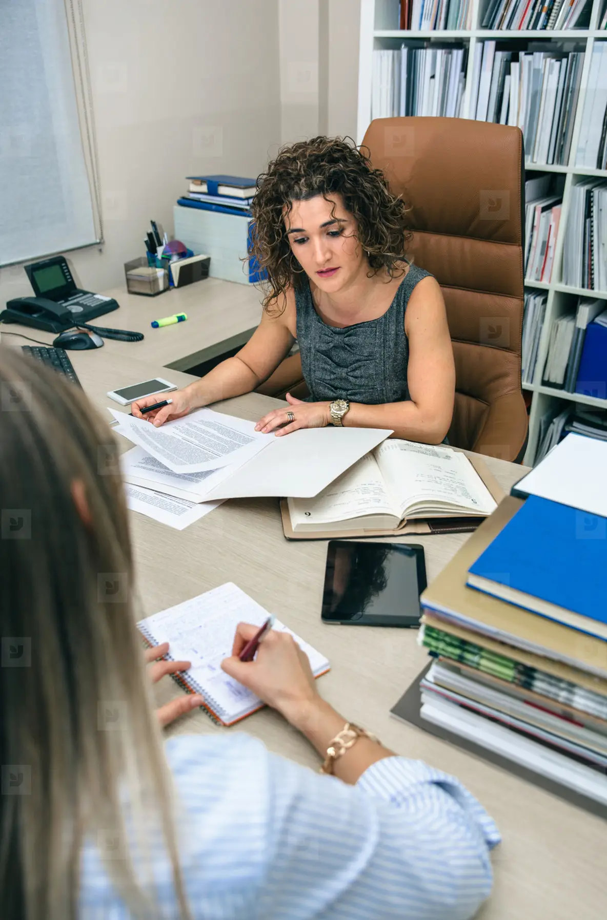 Businesswoman And Secretary Working With Documents In Office Photo ...