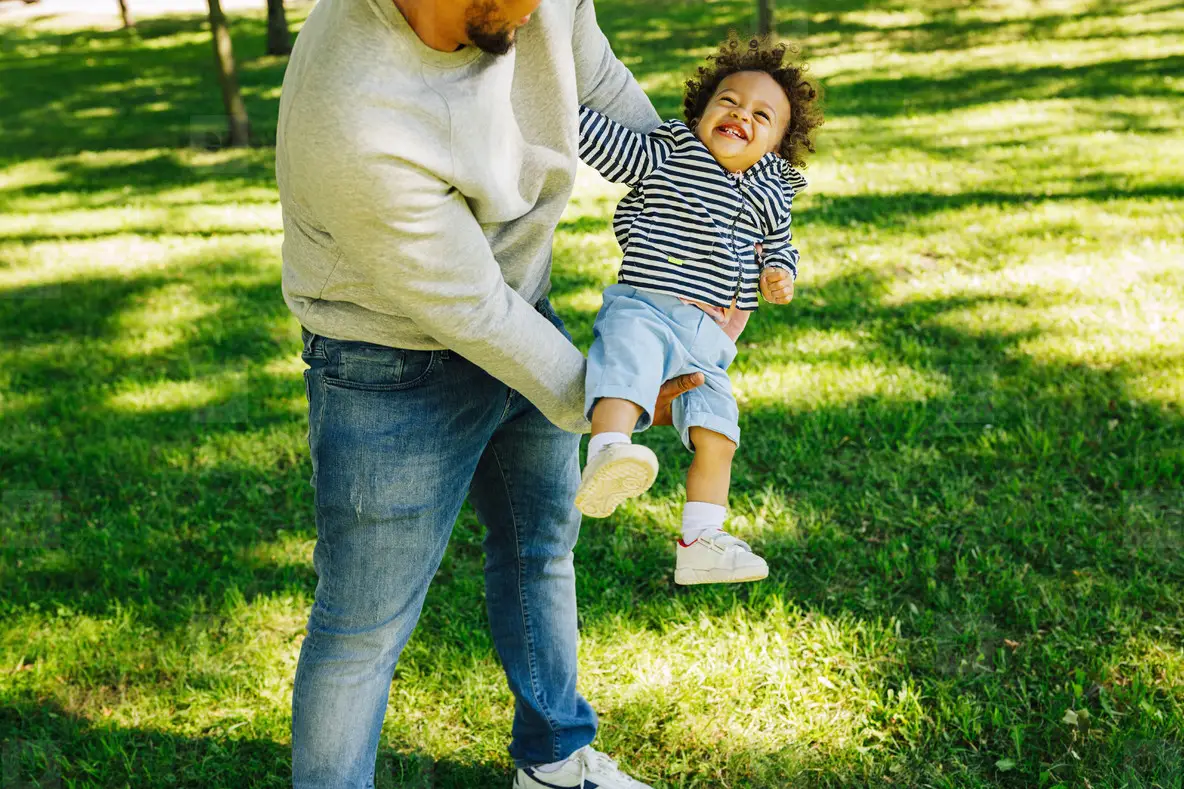 Man Holding His Son On Hands Photo (200854) - YouWorkForThem