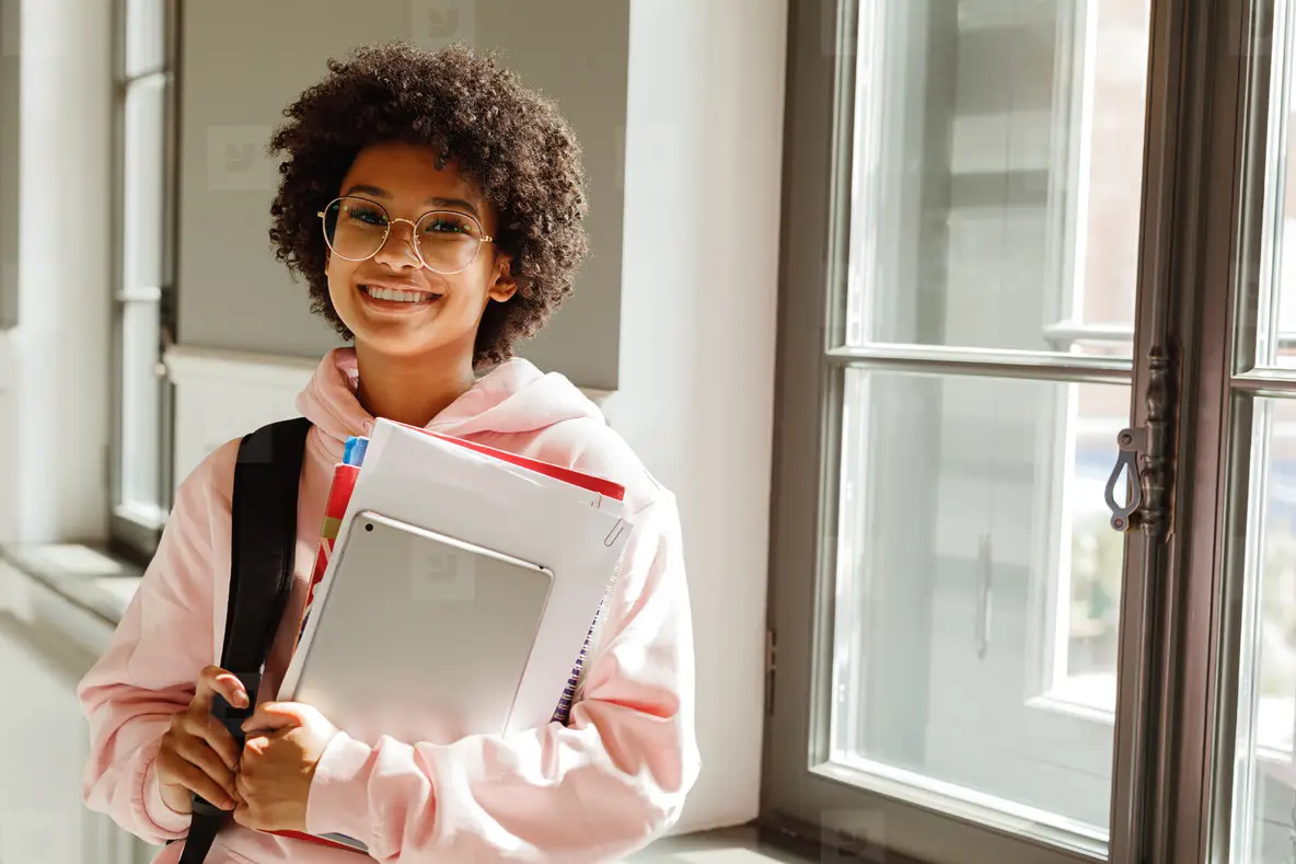 University Student With Books Photo (202225) - YouWorkForThem