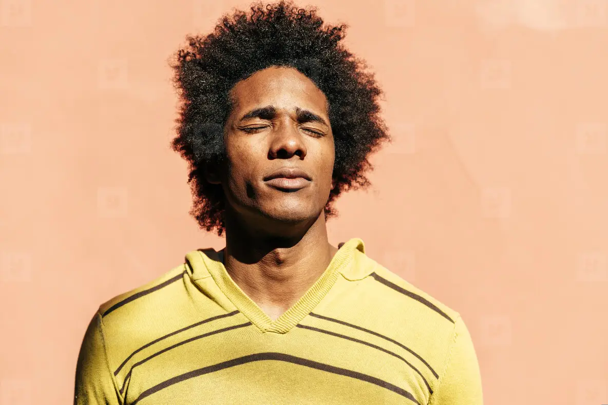 Cuban Black Man Enjoying The Andalusian Sun With His Eyes Closed Photo ...