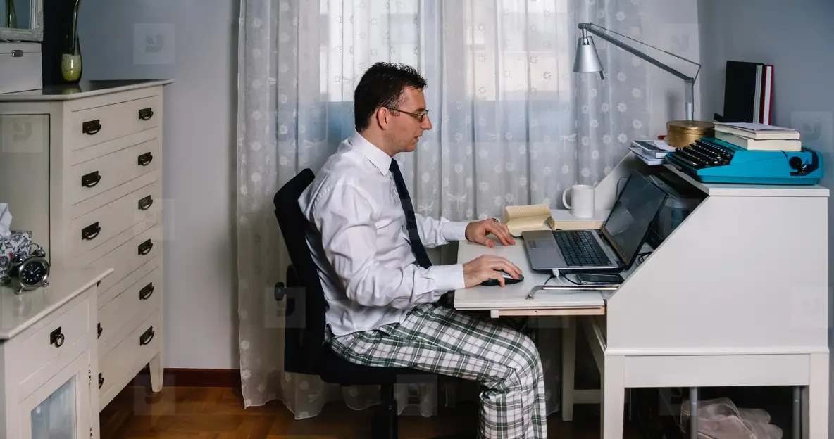 Man Teleworking Wearing Shirt, Tie And Pajama Pants Photo (203029 ...