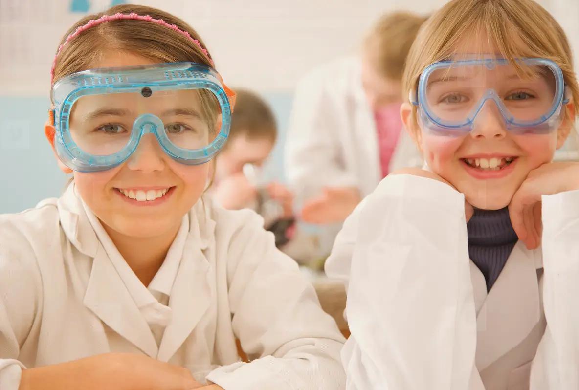 Portrait Smiling Junior High School Girl Students In Science Goggles Photo 212777 YouWorkForThem