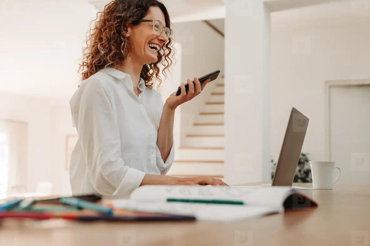 Happy Businesswoman Talking Over Phone At Home Photo (216107 ...