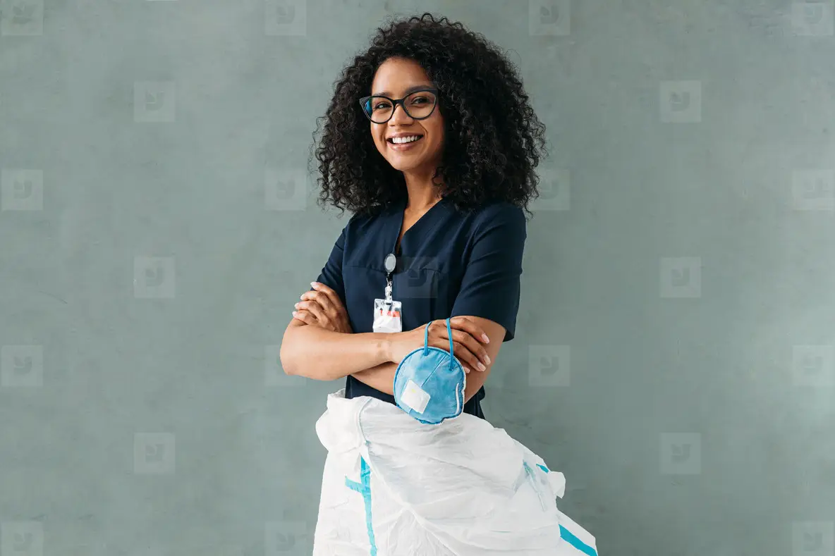 Smiling Nurse Wearing A Medical Uniform With Badge Photo (225763 ...