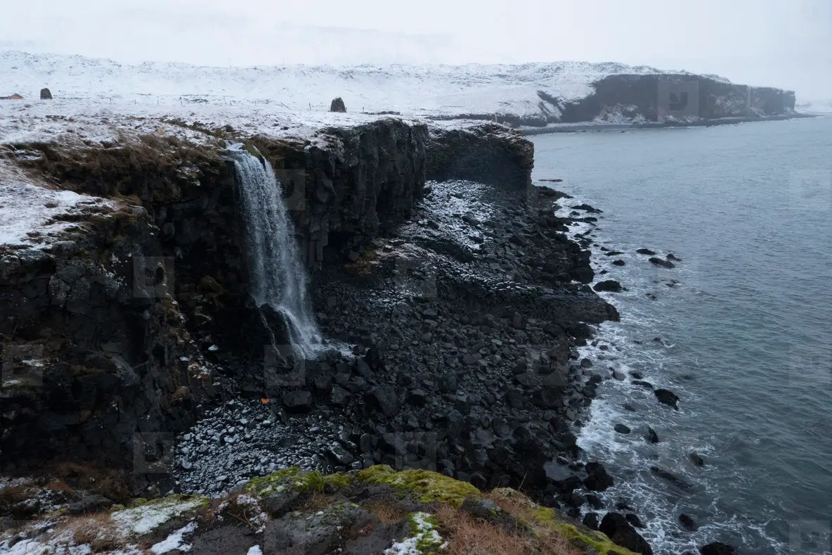 Majestic Snowy Waterfall Over Ocean Cliff Photo (227101) - YouWorkForThem