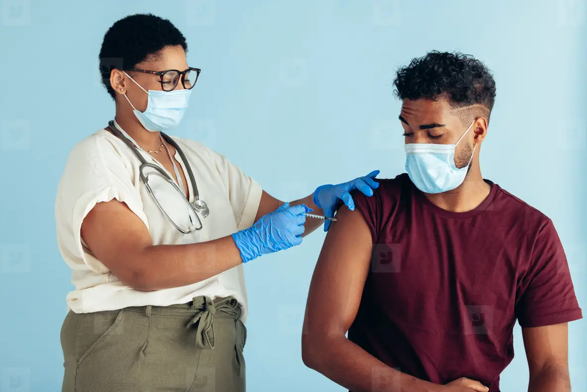 Man Getting Covid-19 Vaccine Photo (231583) - YouWorkForThem