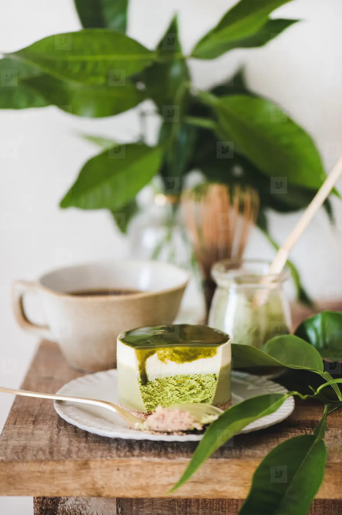 Green Matcha Cheesecake And Black Coffee On Kitchen Counter Photo ...