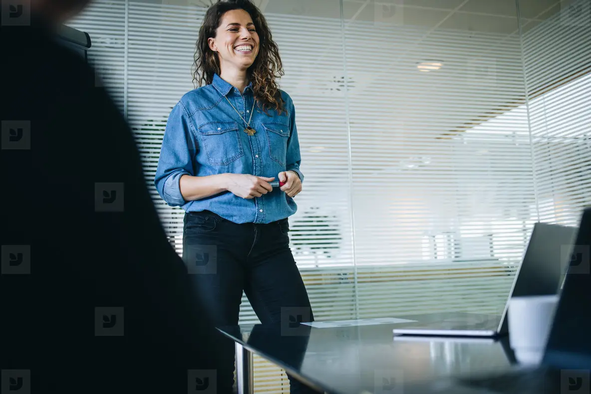 Smiling Female Professional Giving Presentation Photo (235295 ...