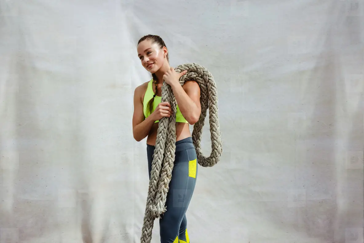 Female Athlete With Battle Rope On White Background Photo (237854 ...