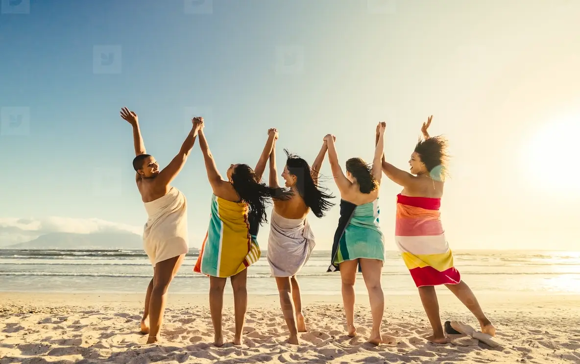 Young Women Cheering Happily At The Beach Photo (248750) - YouWorkForThem