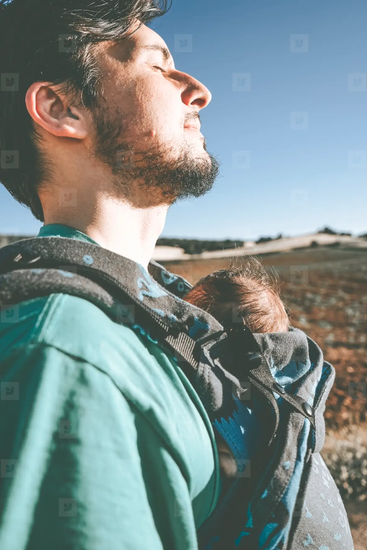 Single Male Parent Carrying Her Baby With A Backpack Photo (249989 ...