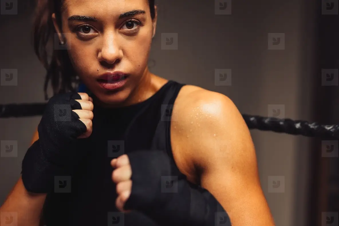 Female Martial Artist Standing In Fighting Position Photo (259074 ...