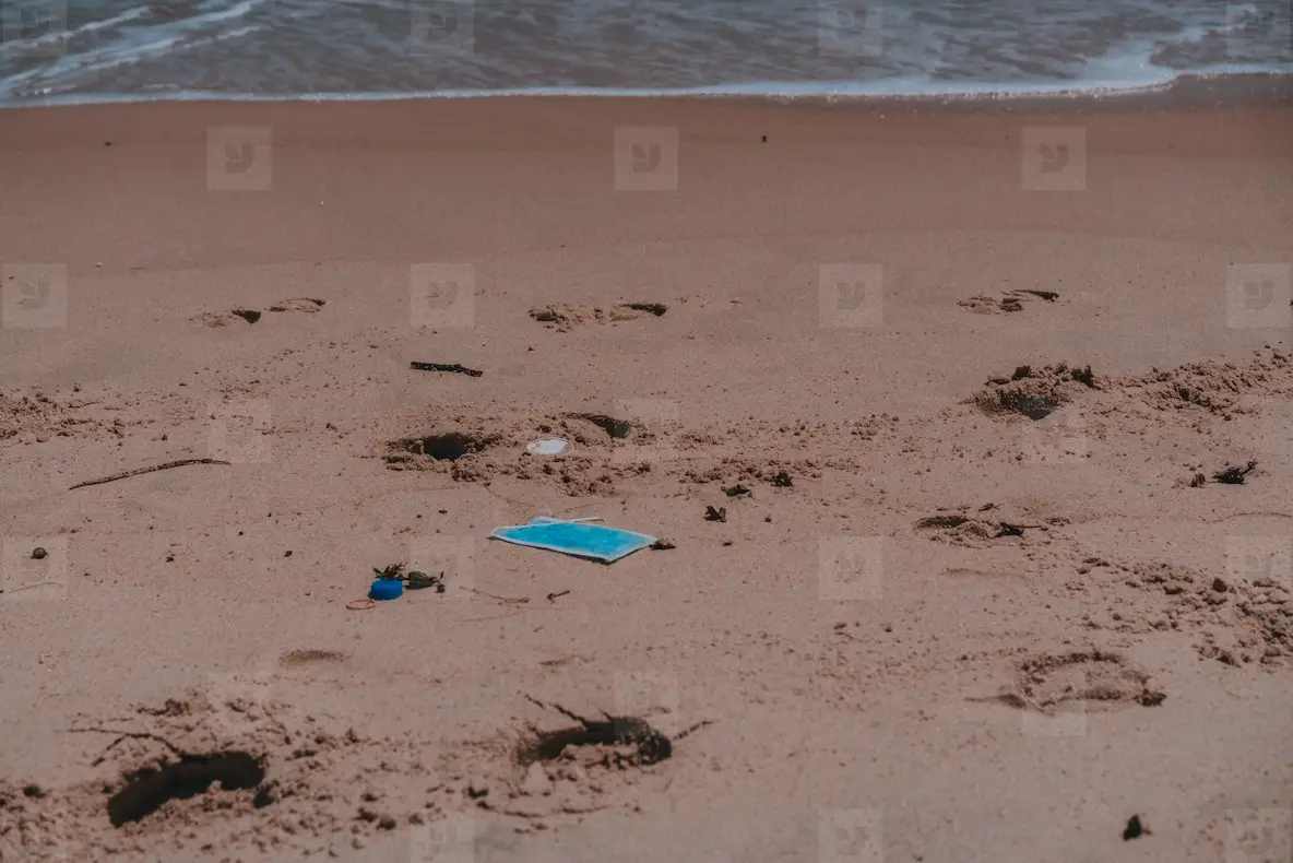Covid Mask Trash On The Beach Photo (259669) - YouWorkForThem
