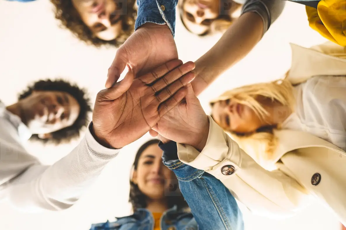 Diverse People Stacking Hands Together Photo (260125) - YouWorkForThem
