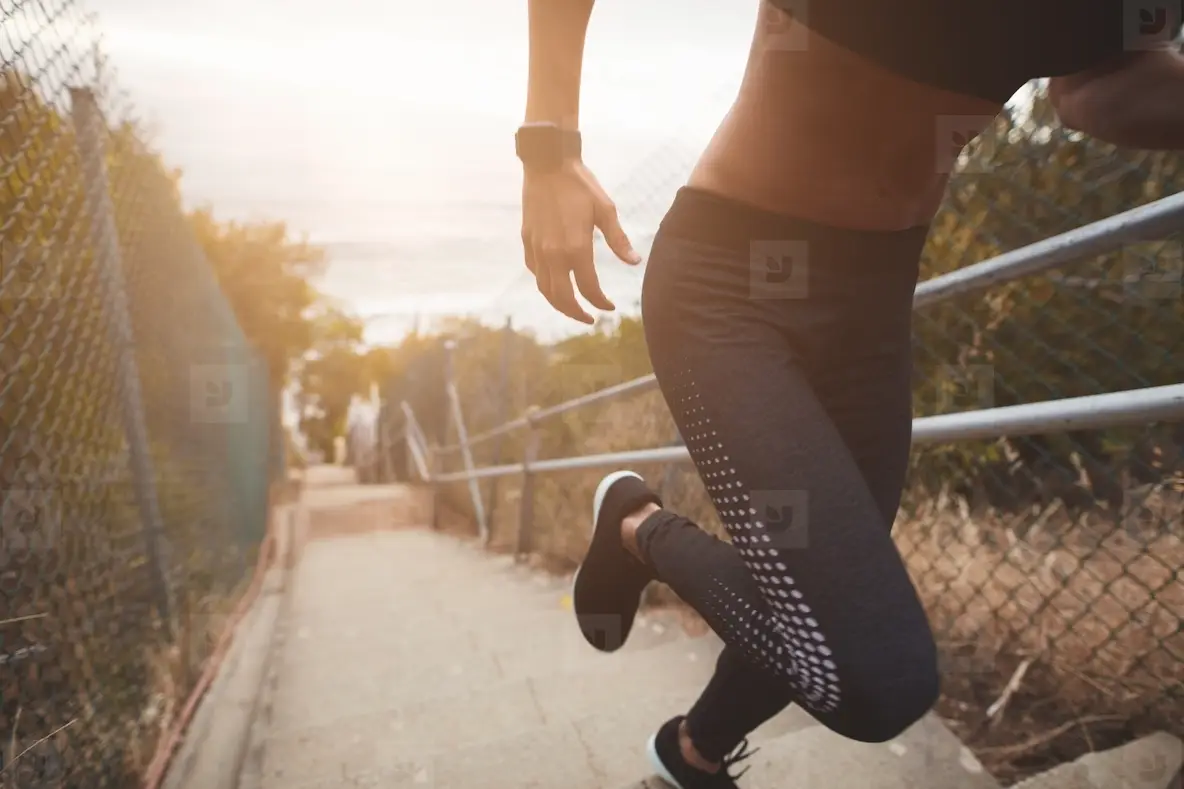 Female Runner Running Up The Stairs Outdoors Photo (260216 ...