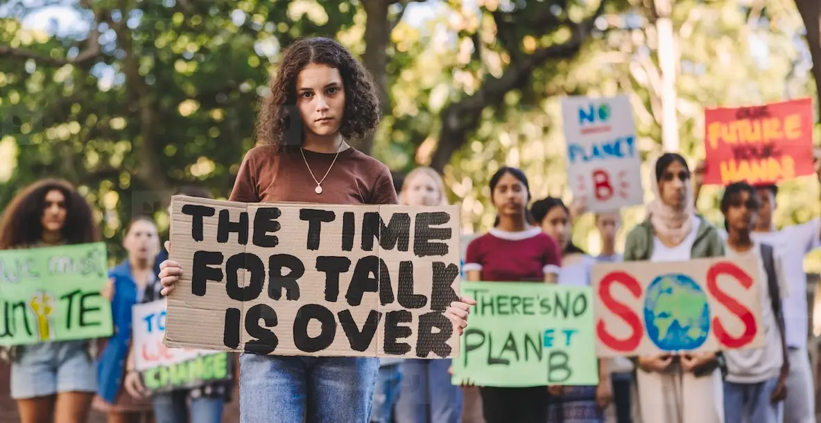 Teenage Girl Leading A March Against Climate Change Photo (260224 ...