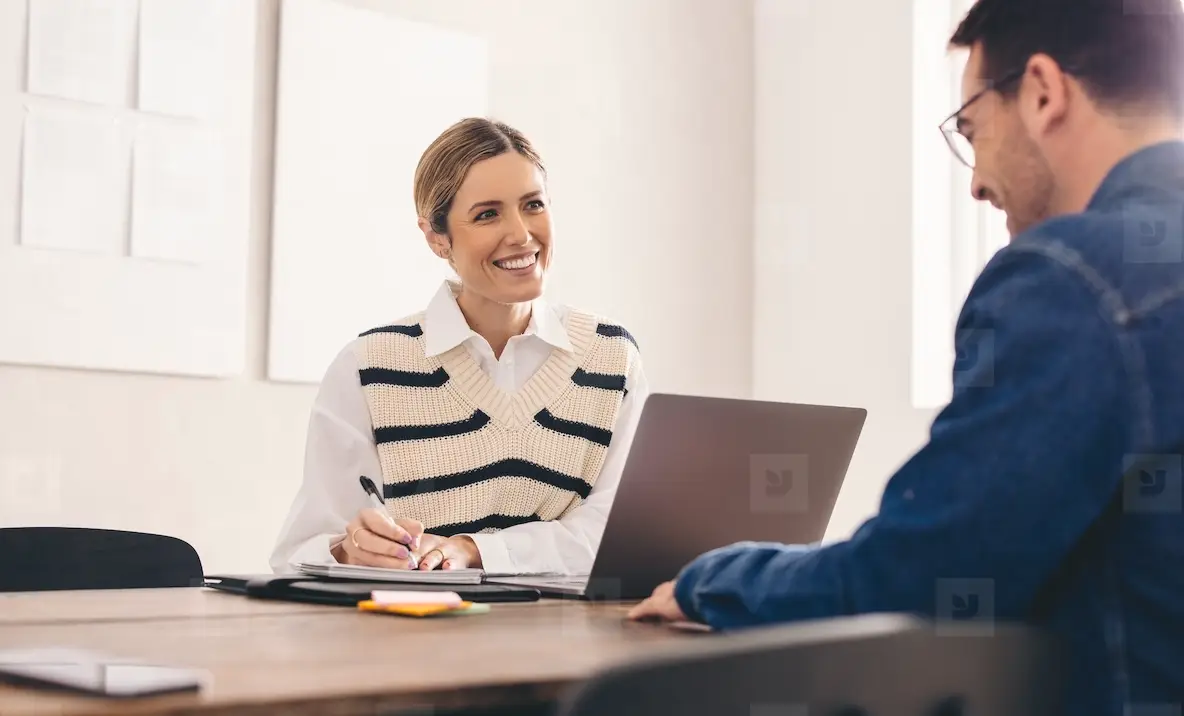 Female Hiring Manager Interviewing A Job Applicant In Her Office Photo ...