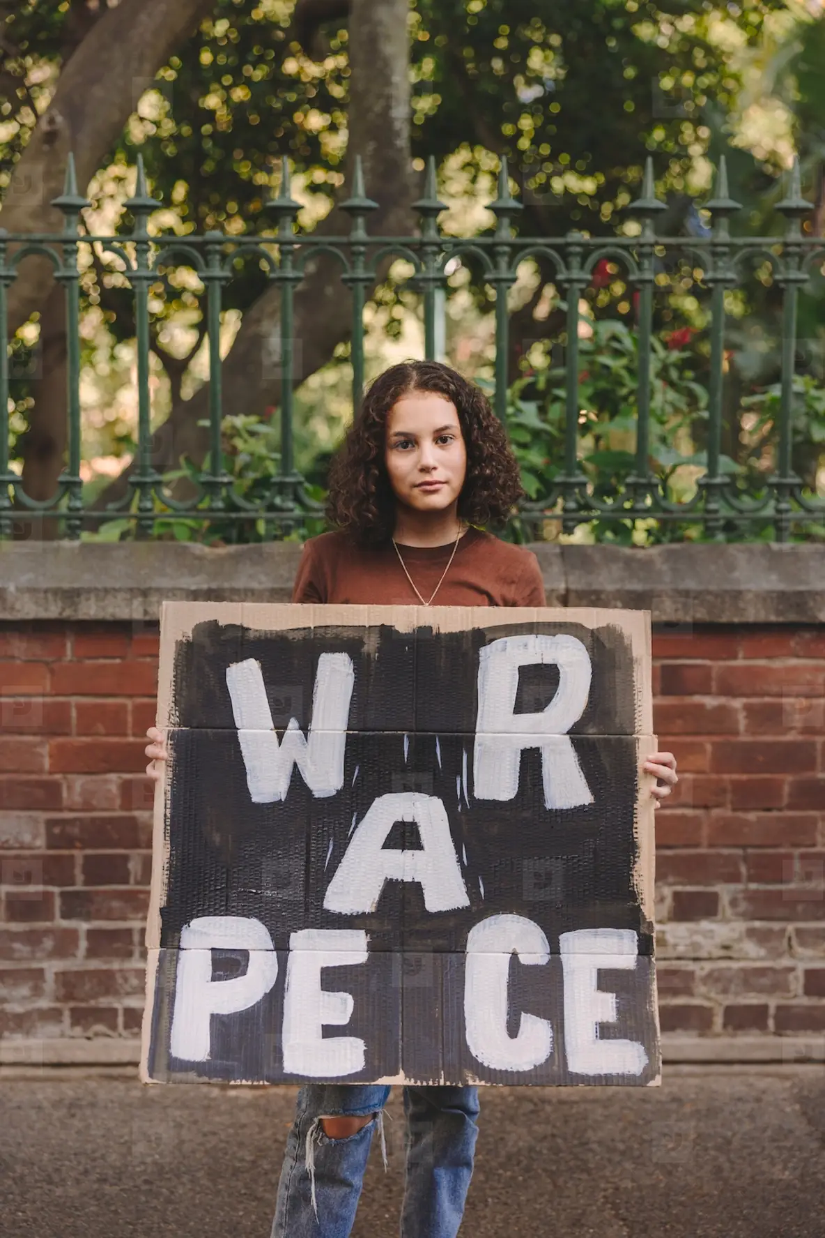 Teenage Activist Holding An Anti-war Poster Photo (265732) - YouWorkForThem