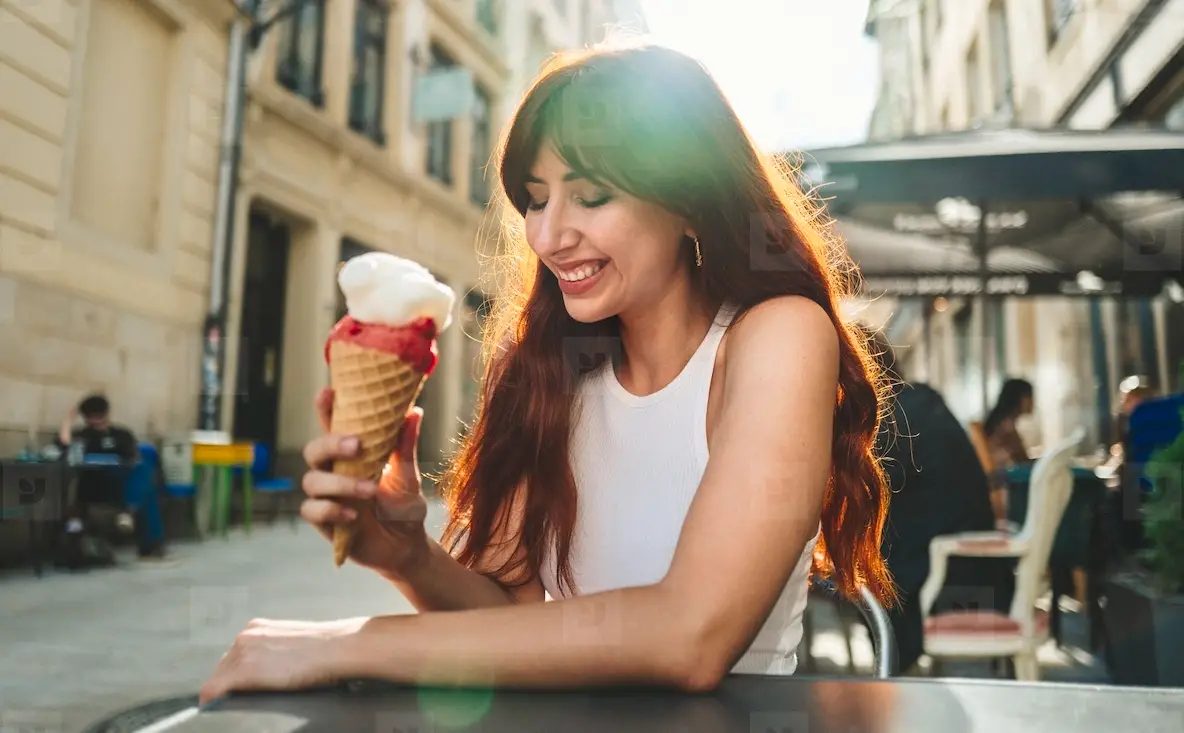 Tourist Eating An Ice Cream At An Outdoor Restaurant Photo (266256 ...