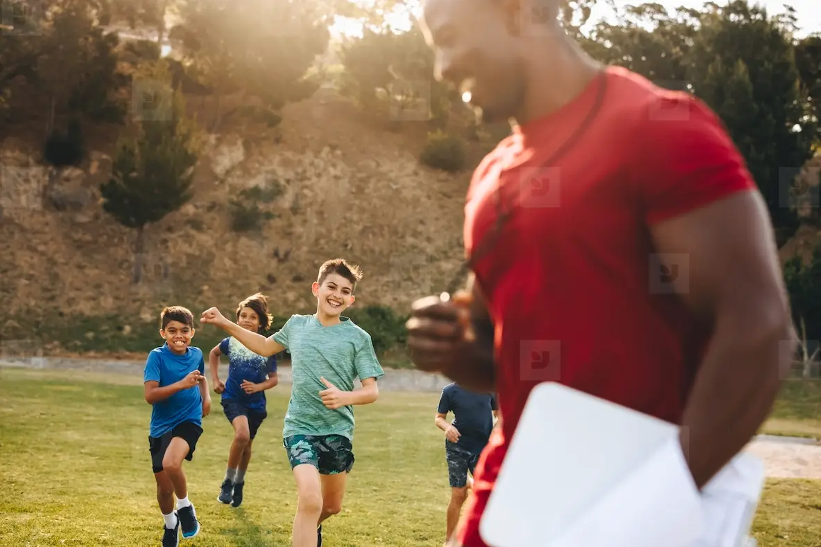Children Running On A School Ground During PE Photo (266938 ...