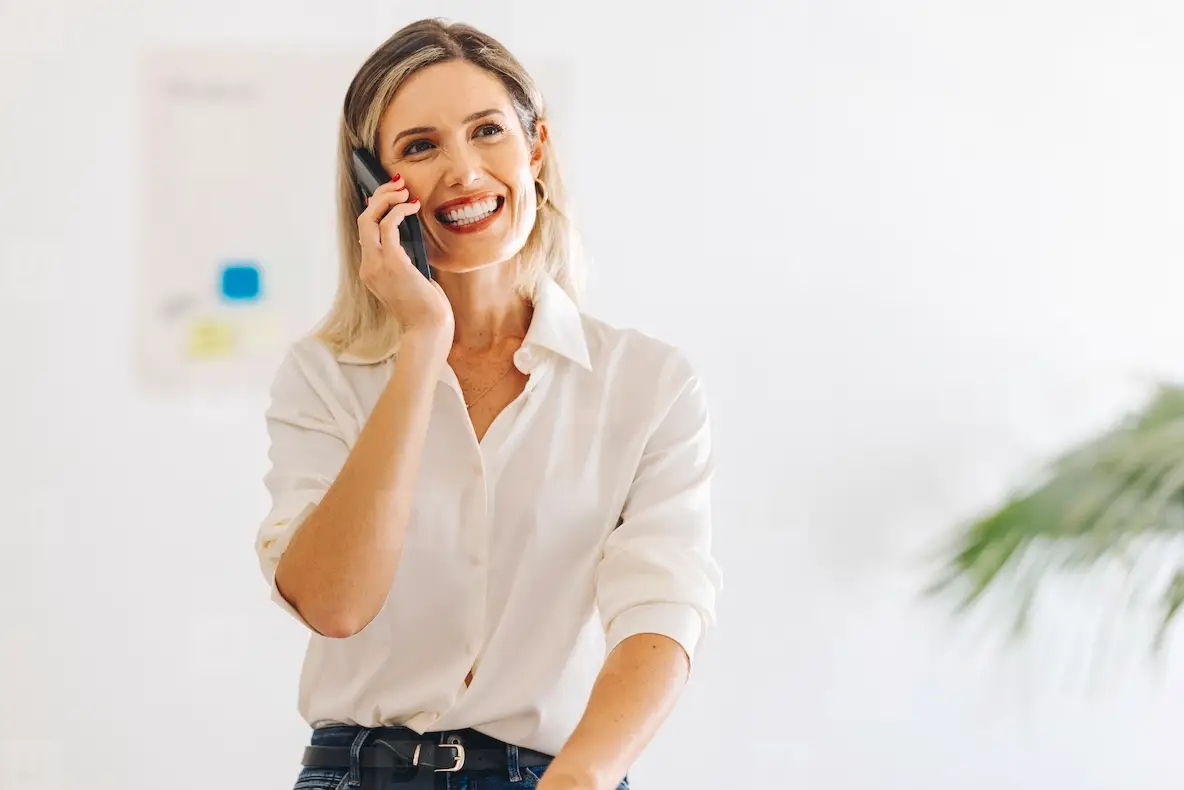 Successful Businesswoman Taking A Phone Call In A Creative Office Photo ...